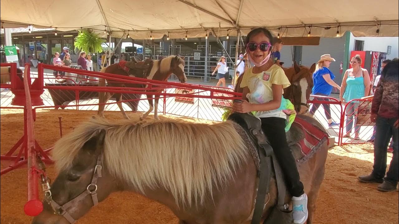 kids doing pony ride at Clay county fair - YouTube