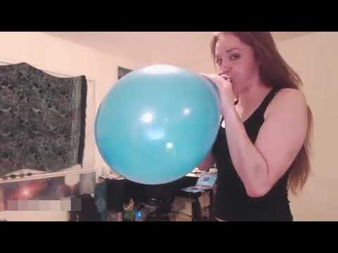 Balloon Girl Blows The Blue Balloon to its Maximum Capacity
