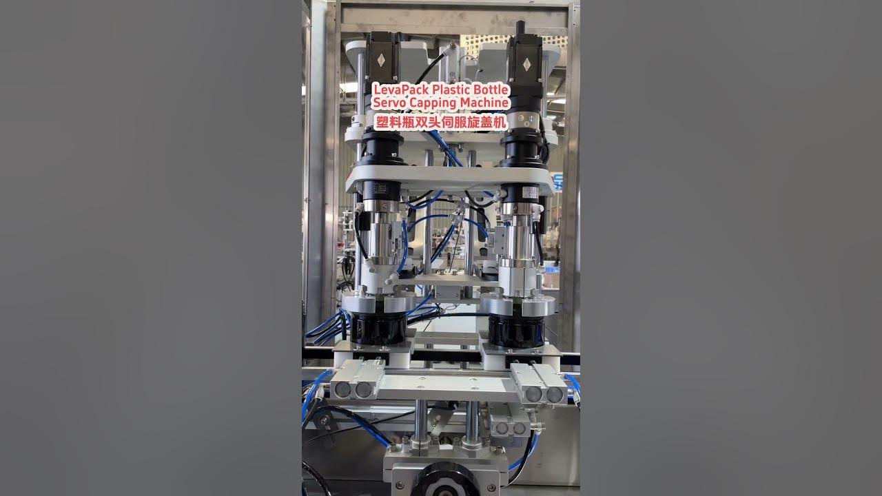 LevaPack Plastic Bottle Double Head Servo Capping Machine - YouTube