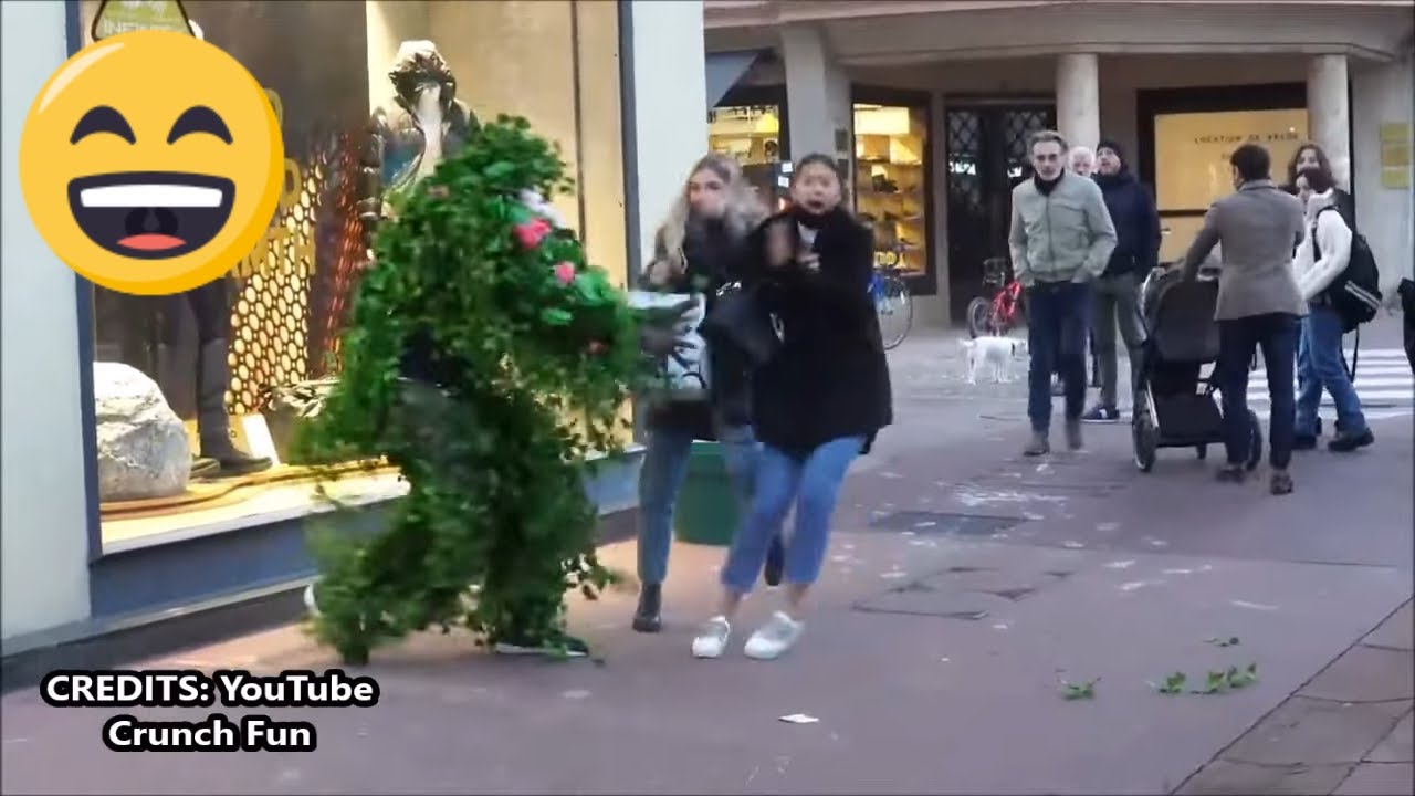 Her reaction after being scared bush man prank - YouTube