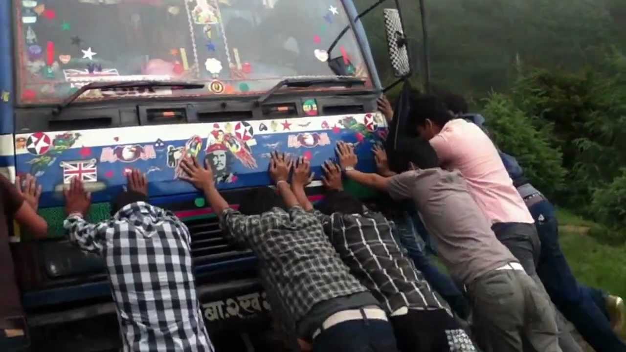 brave boys pushing bus - YouTube