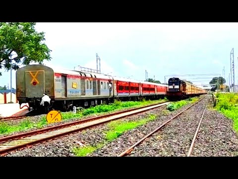 VERAVAL-PUNE EXPRESS CROSSING THE CALMLY STANDING JABALPUR-SOMNATH ...