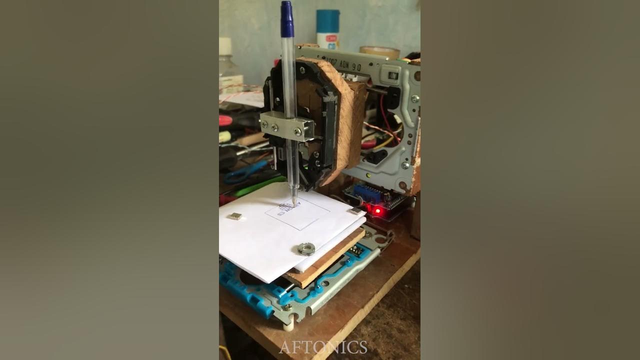 Mini CNC plotter 2D using scrap CD / DVD - YouTube