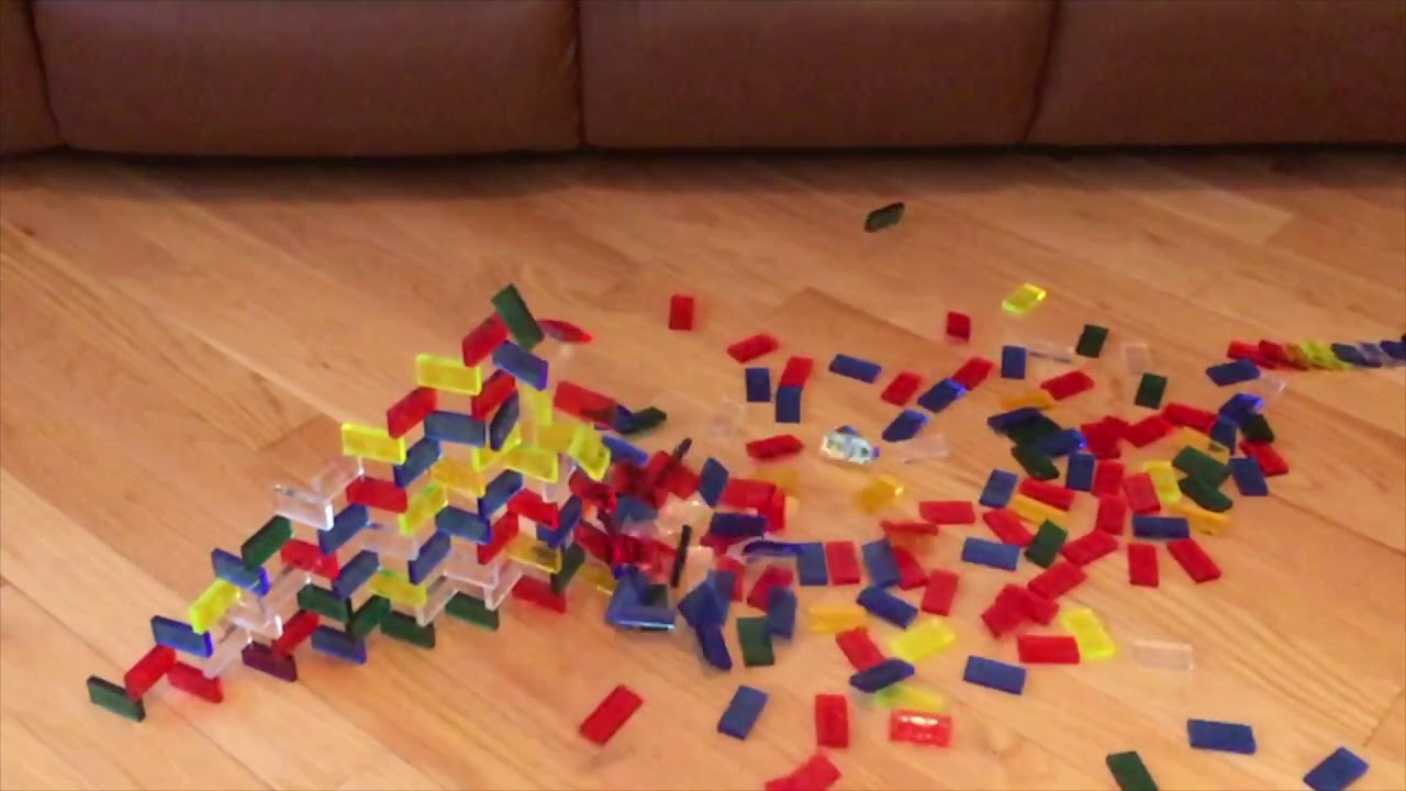 Dominoes falling in slow motion is oddly satisfying - YouTube