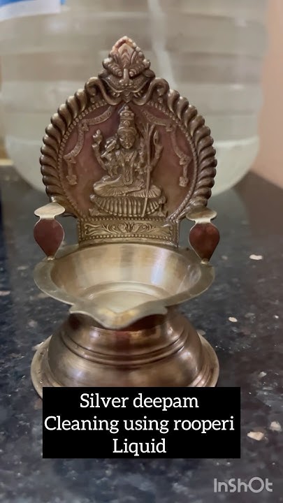 Silver deepam cleaning using rooperi liquid #rooperi #silver - YouTube