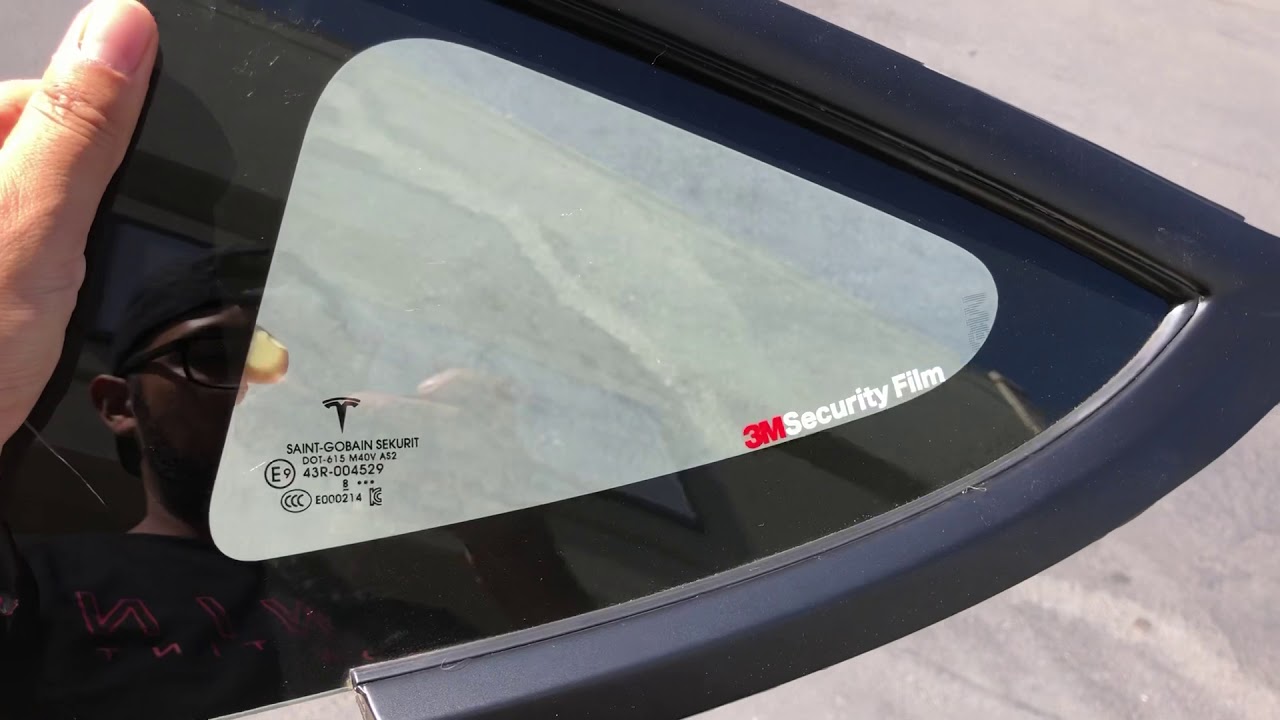 We broke a Tesla Model 3 Quarter Window!! - YouTube