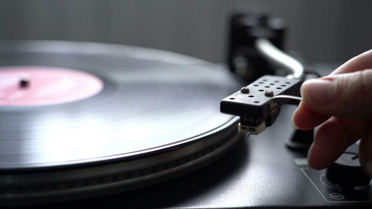 Cinemagraph Loop Vintage Vinyl Turntable Record Player with female hand ...