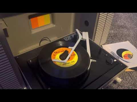 Stacking record player playes 4 beach boys 45 rpm records - YouTube