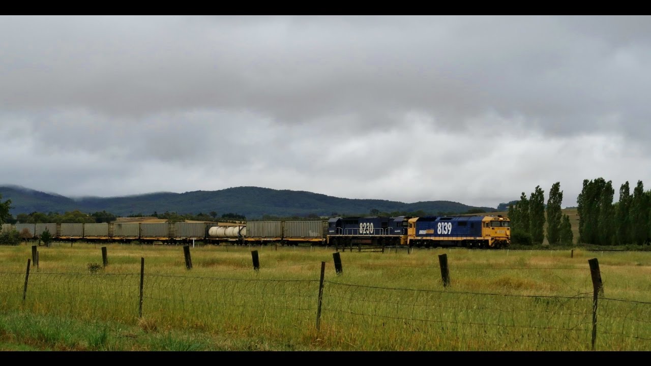 8139+8230 bring empty garbage train #2120 through the location of ...