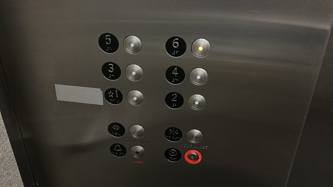 Schindler Traction Orange Elevators at Economy Pkg. Deck- Tampa Intl. Airport- Tampa, FL, USA ...