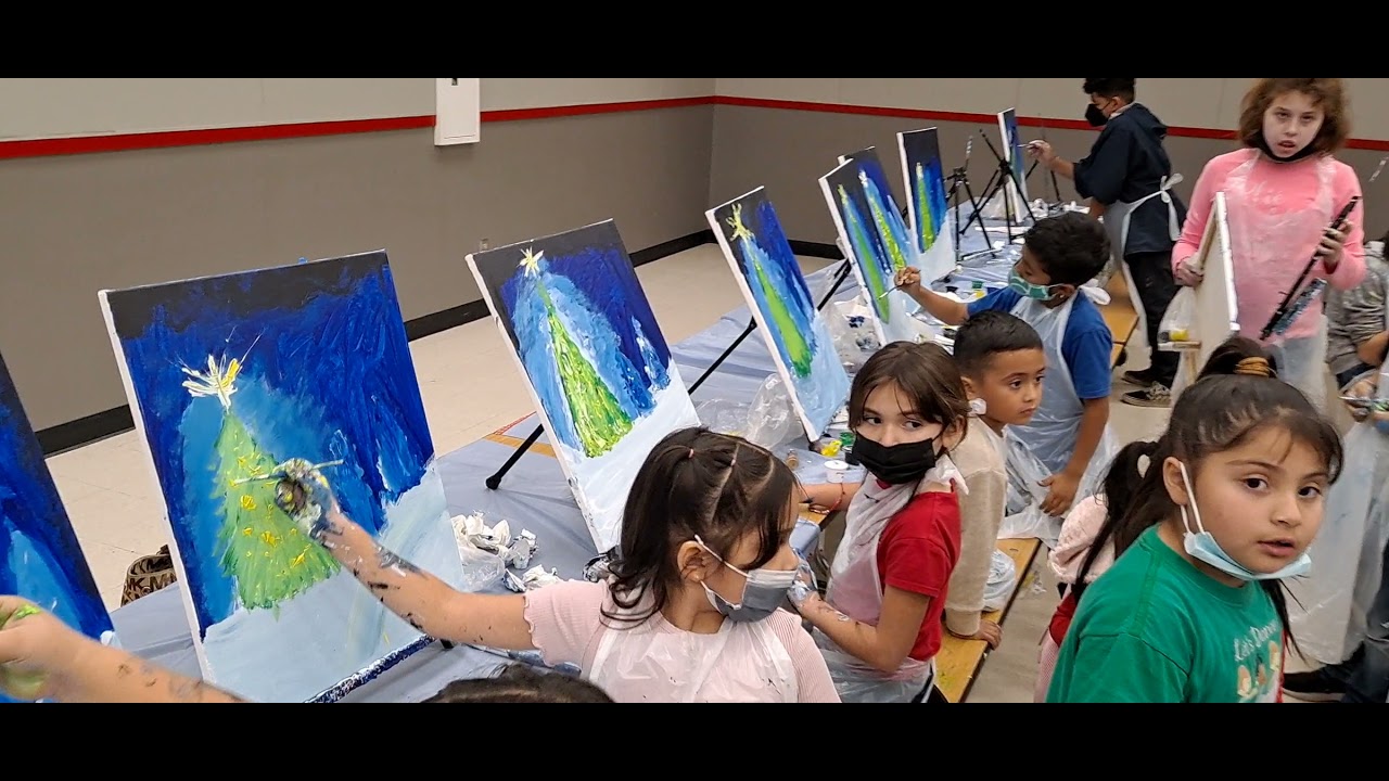 Kerman Floyd painting the Christmas tree with gems but they haven't ...