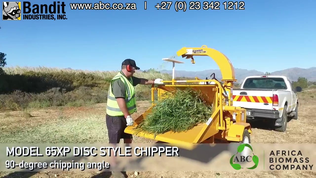 Bandit Chipper Model 65XP Disc Style Hand-Fed Brush Chipper - YouTube