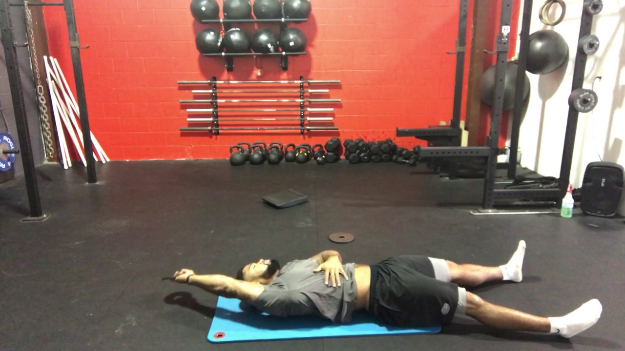 Supine Single Arm Press and Reach - YouTube