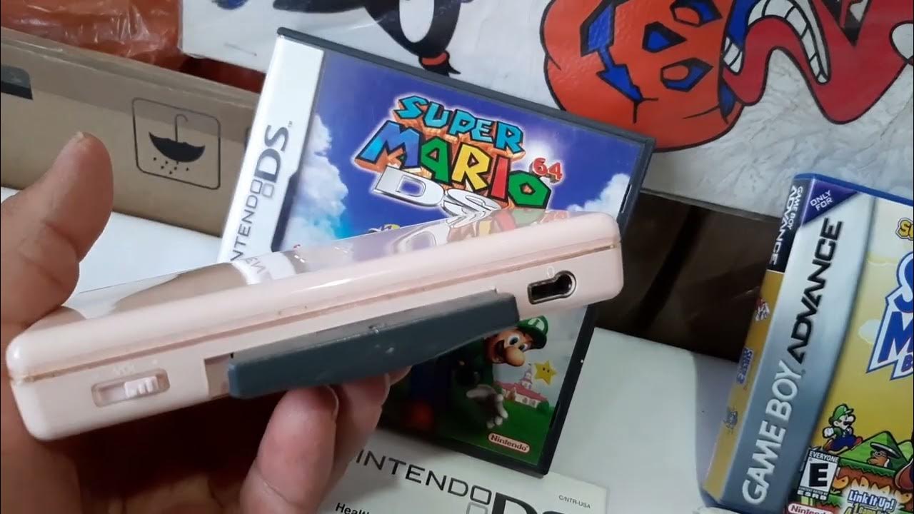 ds lite rosa con mario 64ds,new super mario bros y super mario advance 4 de gba,funcionando ...