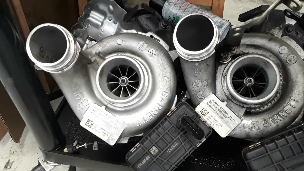 Stock Mercedes OM642 turbocharger compared to euro-spec gt2260 - YouTube