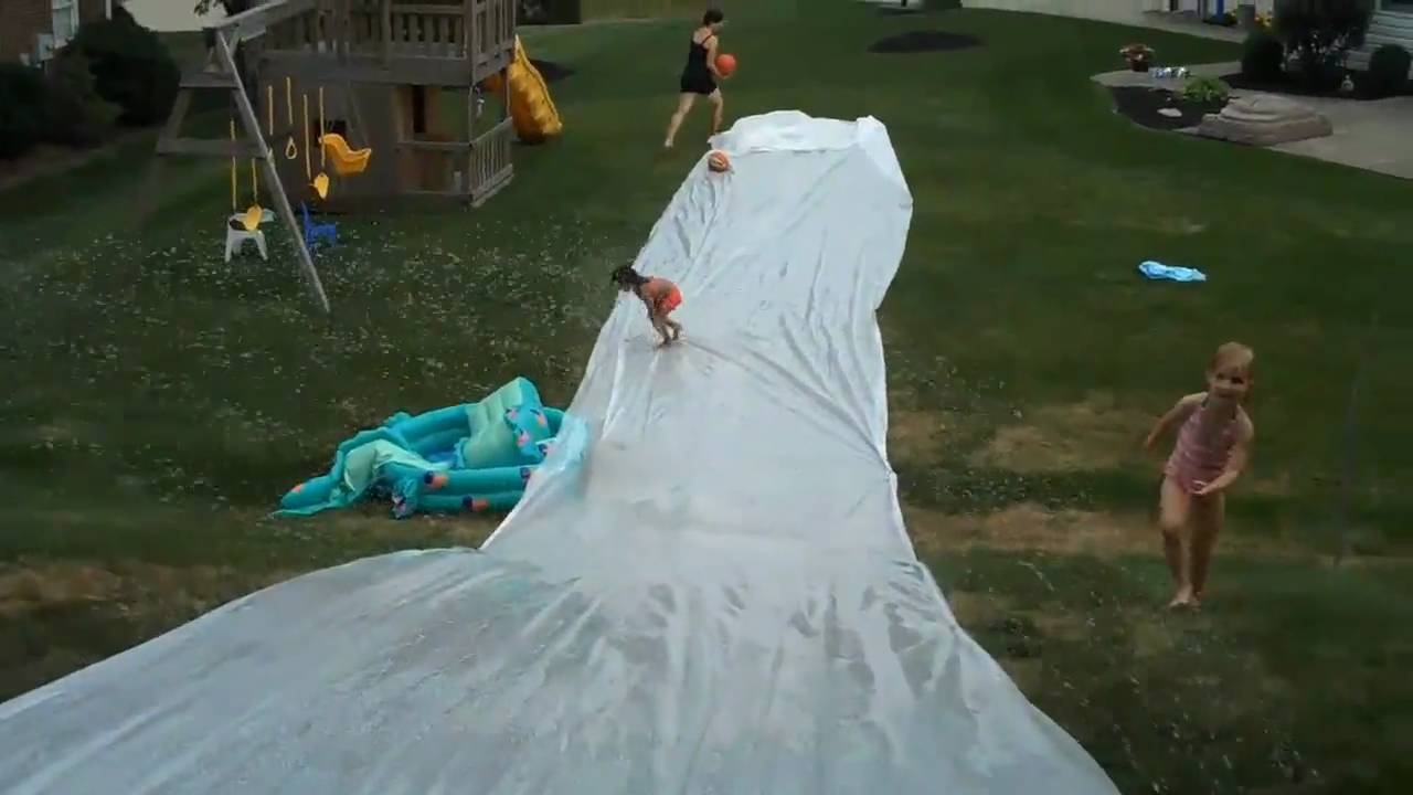 100 Foot Backyard Water Slide - YouTube