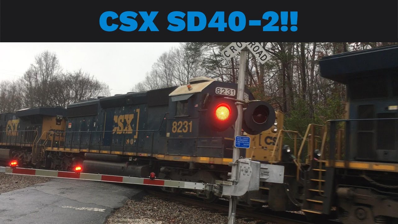 CSX SD40-2 8231 rolls second back on the CLINCHFIELD - YouTube