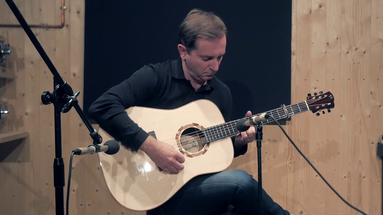 Pi guitars Madagascar rosewood D in the hands of the greek flat picker ...