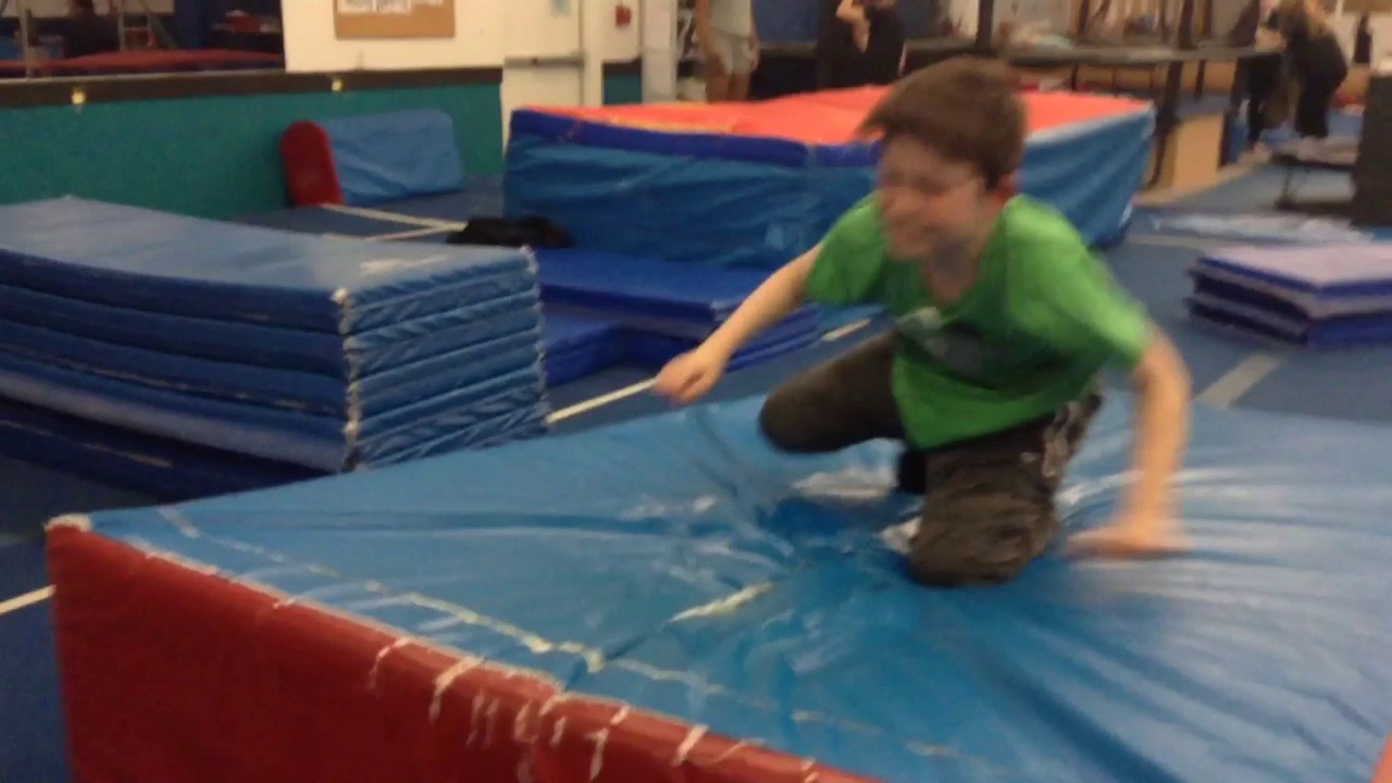 teaching my friend a back flip (kind of) - YouTube