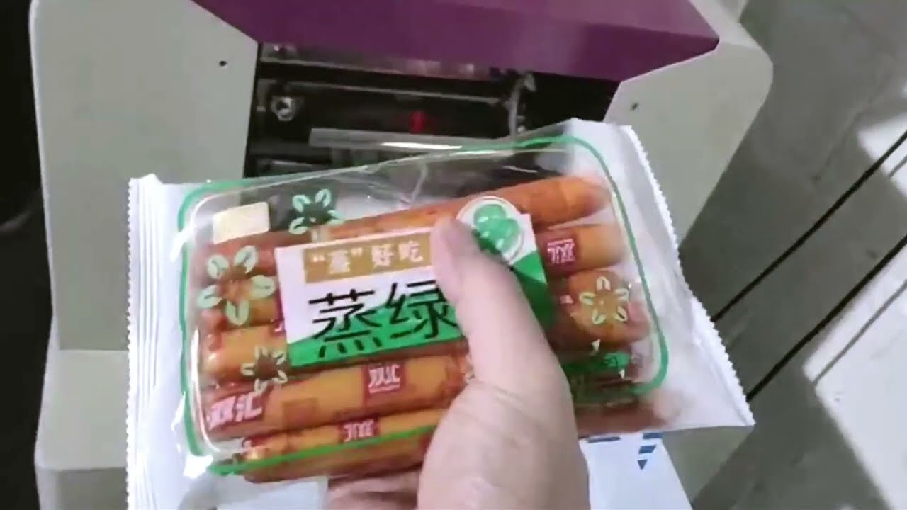 Sausage flow wrapping machine food pillow pack - YouTube