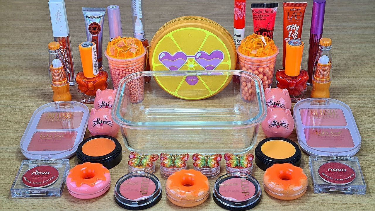 ORANGE SLIME Mixing makeup and glitter into Clear Slime Satisfying ...