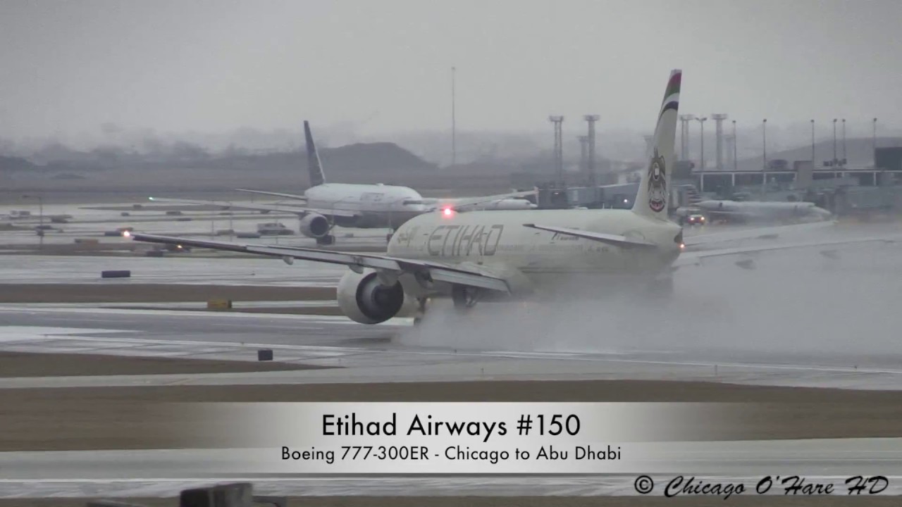 Extreme Wind & Rain Heavy Boeing 777 Takeoff - Etihad #150 - Chicago O ...