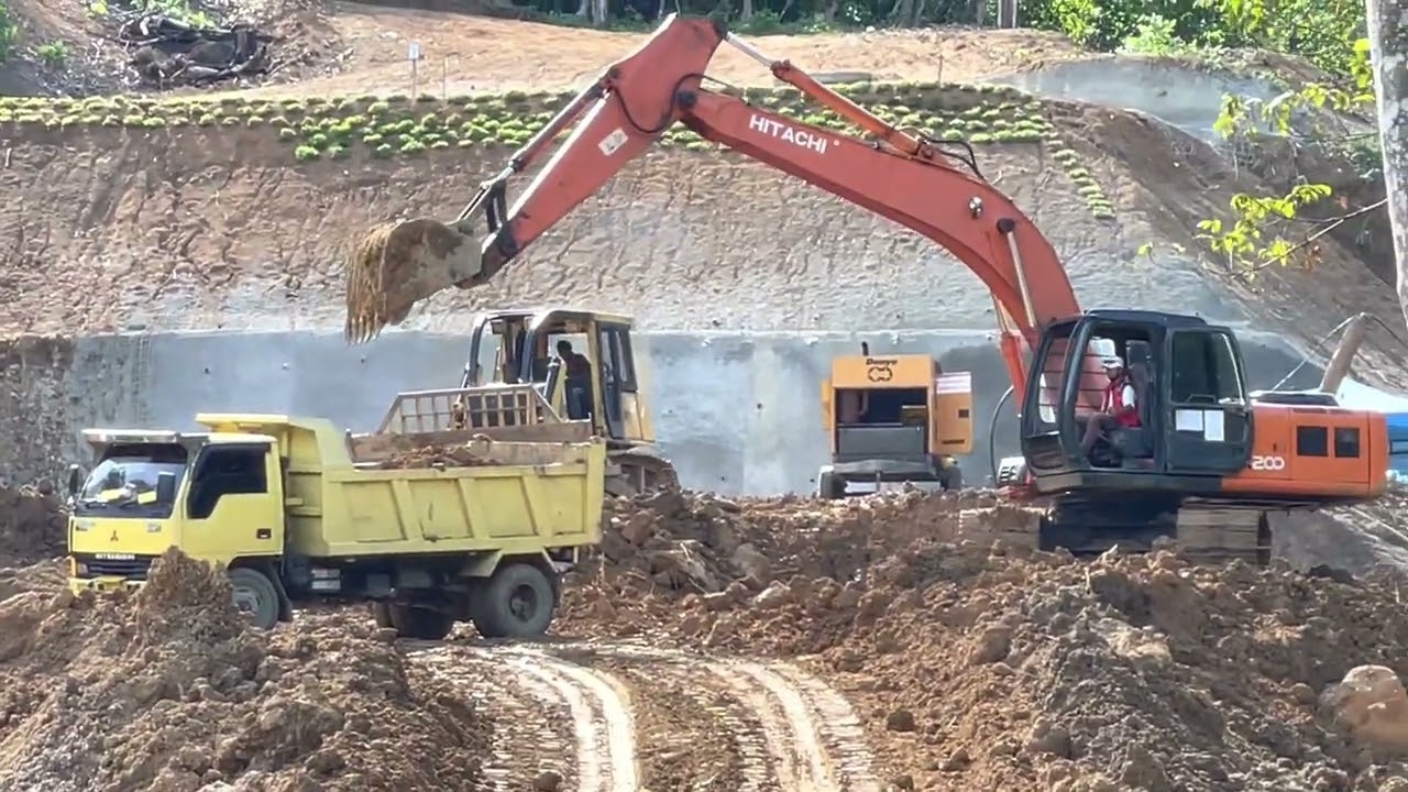Bulldozer working the road, earth loading excavator - YouTube