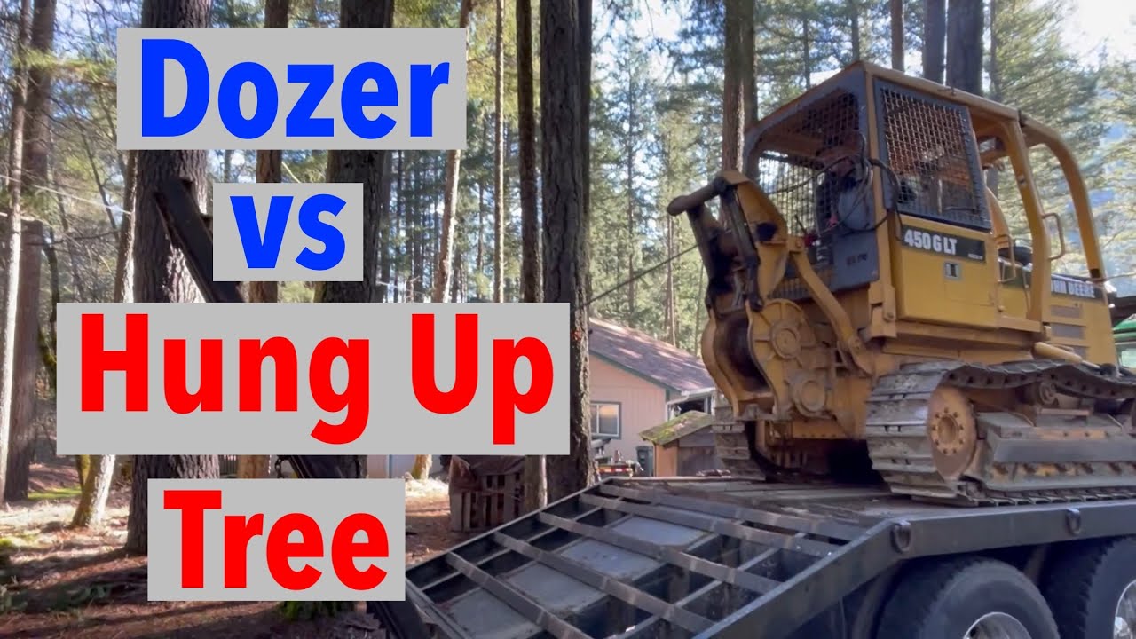 Battle Between Hung Up Tree & John Deere 450 G Dozer - YouTube