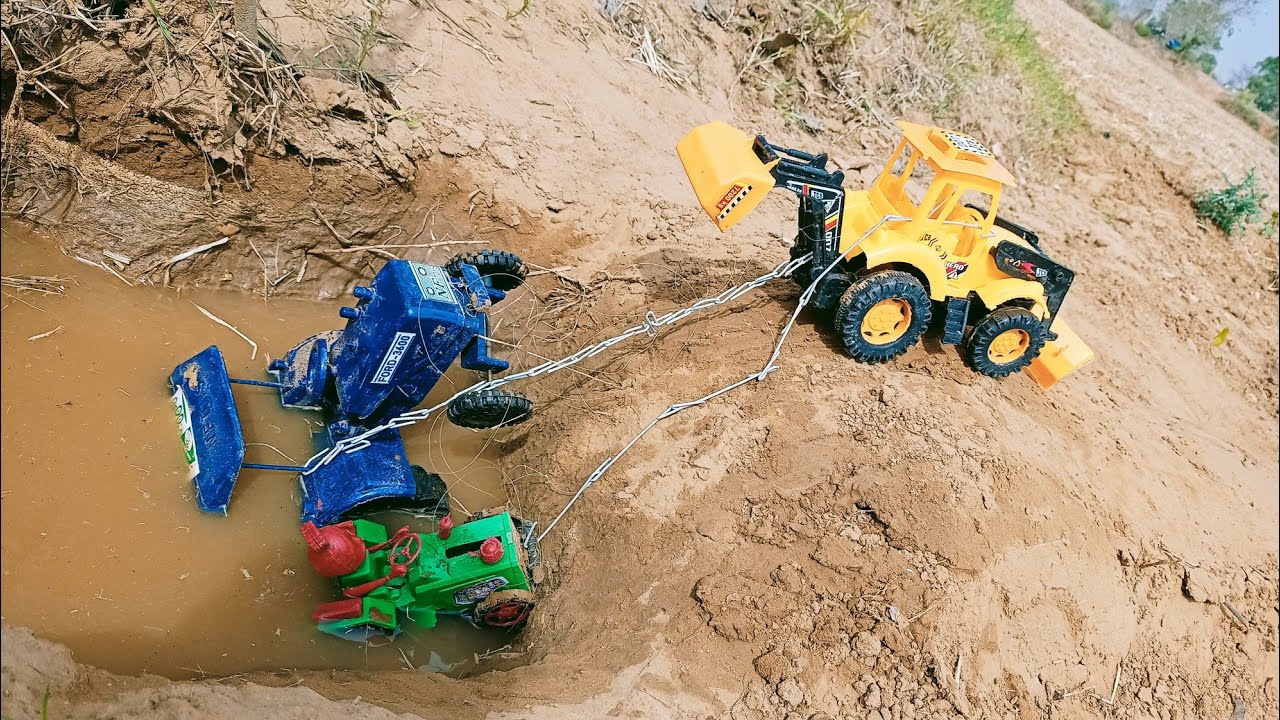 mini john deere tractor stuck in pit pulling by JCB 3dx | tractor jcb ...