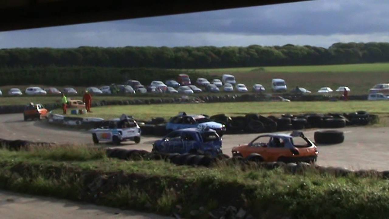 Crimond raceway bangers July 2nd 2016 nissan micra flies over tyrewall ...
