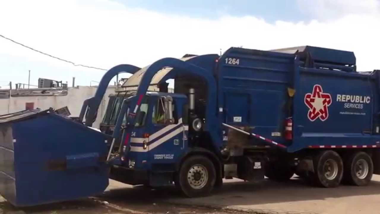 Republic Services front loader emptying store container - YouTube