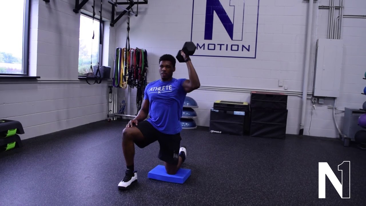 Eccentric Half Kneeling Shoulder Press - YouTube