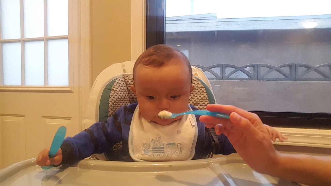 Baby Victor eating cereal at 7 months - YouTube
