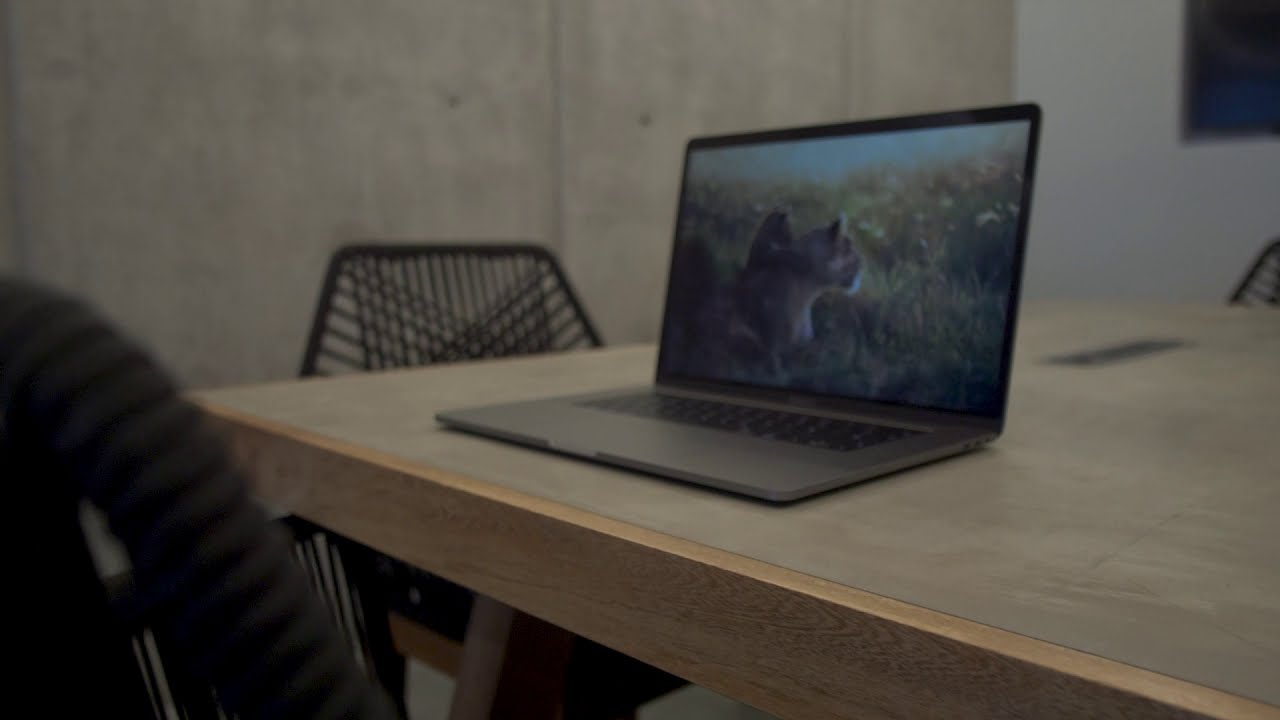 Macbook laptop on wooden table | Free stock Mac video - YouTube