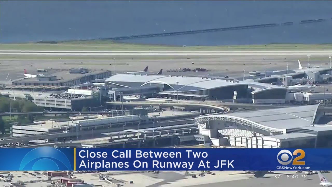 Close call between 2 planes on runway at Kennedy Airport - YouTube