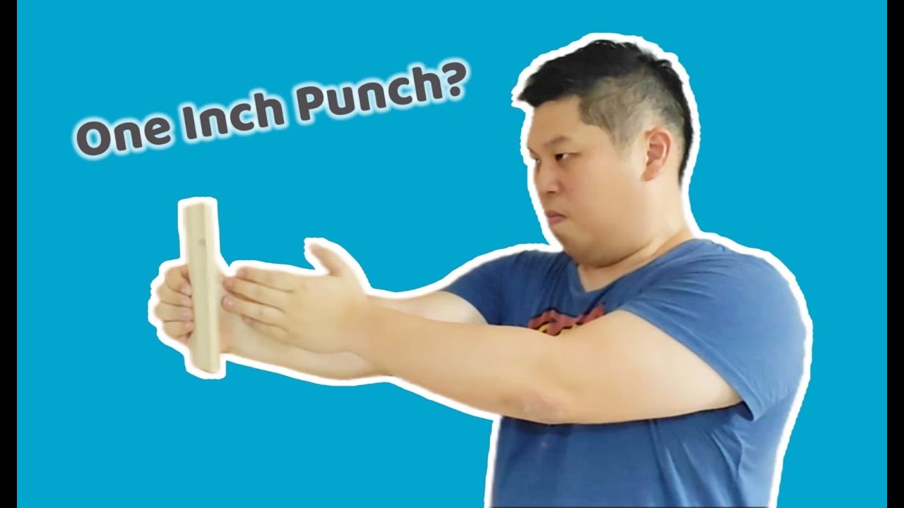 Using One Inch Punch to Break a board(half) while holding it with the ...