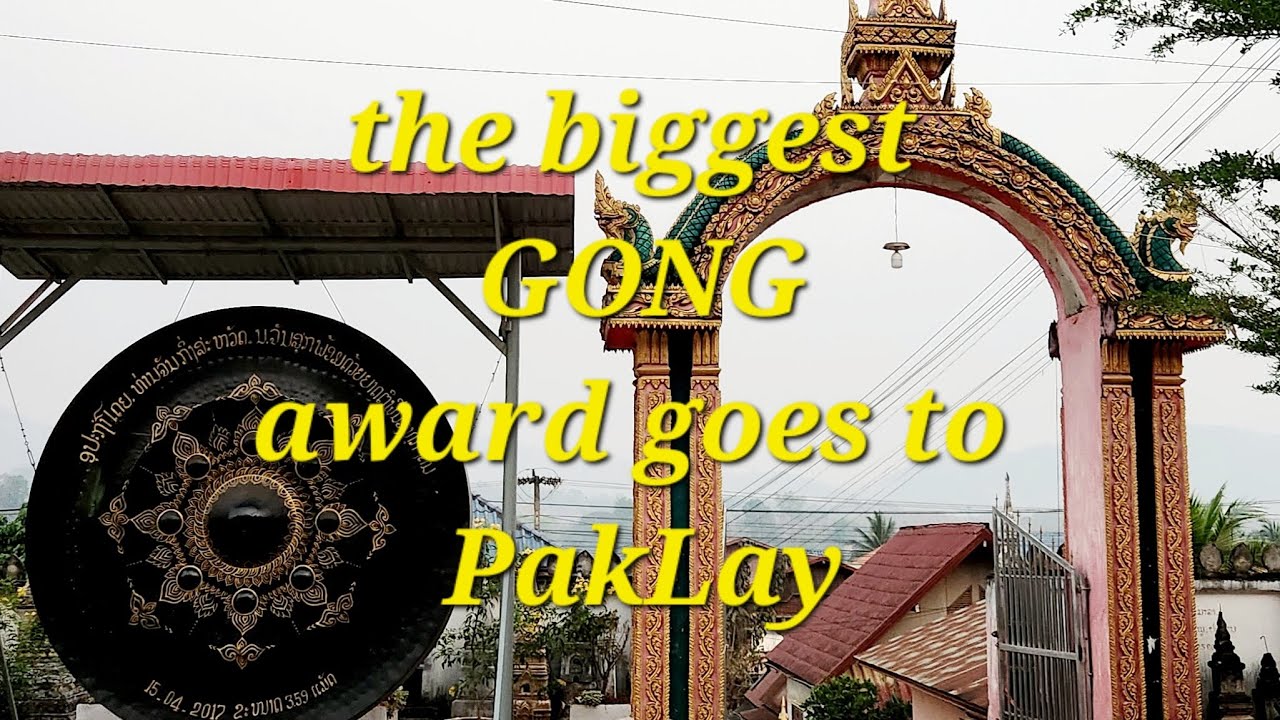 huge gong at hillside buddhist monk temple in paklay laos - YouTube