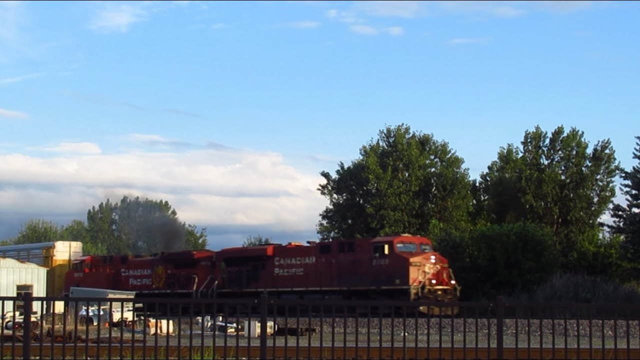 CSX I-166 Passes By Fostoria With A Duo Of CPKC GEVOs Leading - YouTube