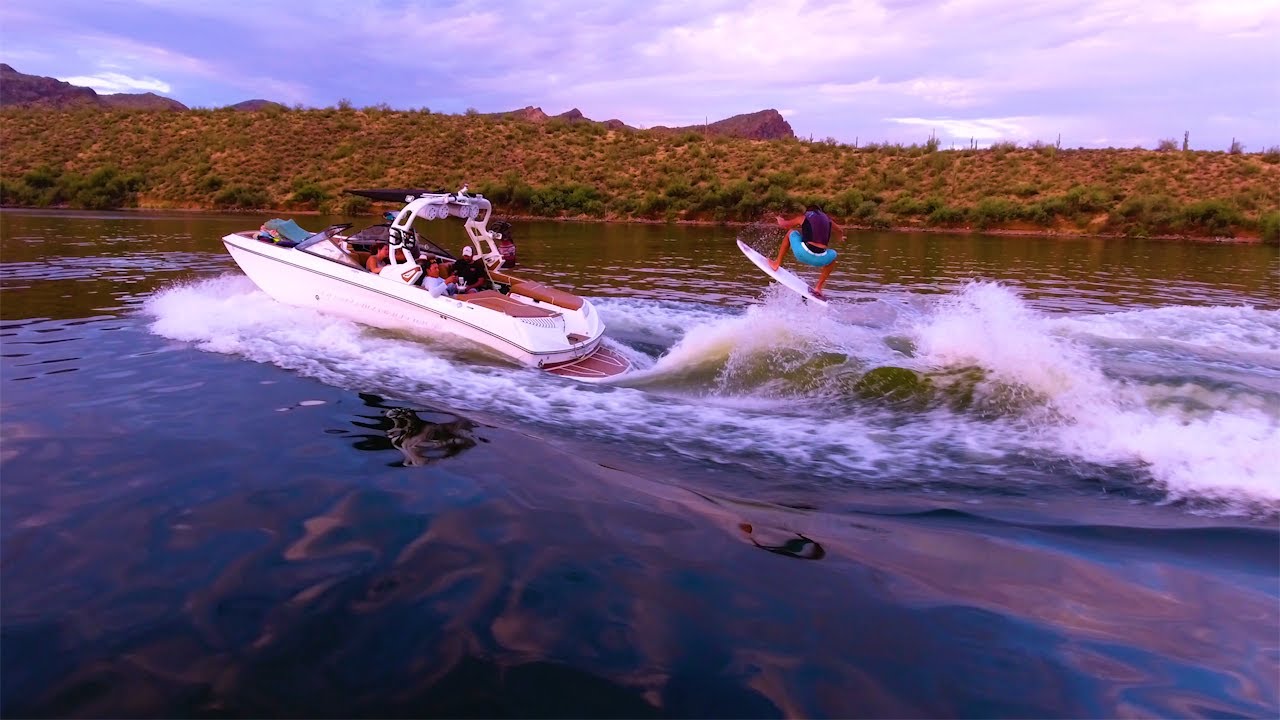 Pro wake surfing with drone behind 2017 Nautique G23 - YouTube