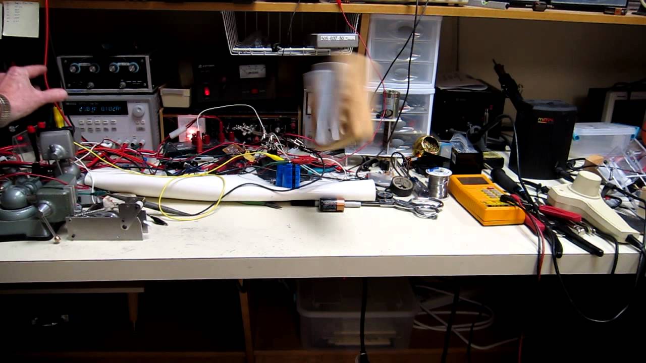 A capacitor plus spring powered flipper experiment - YouTube