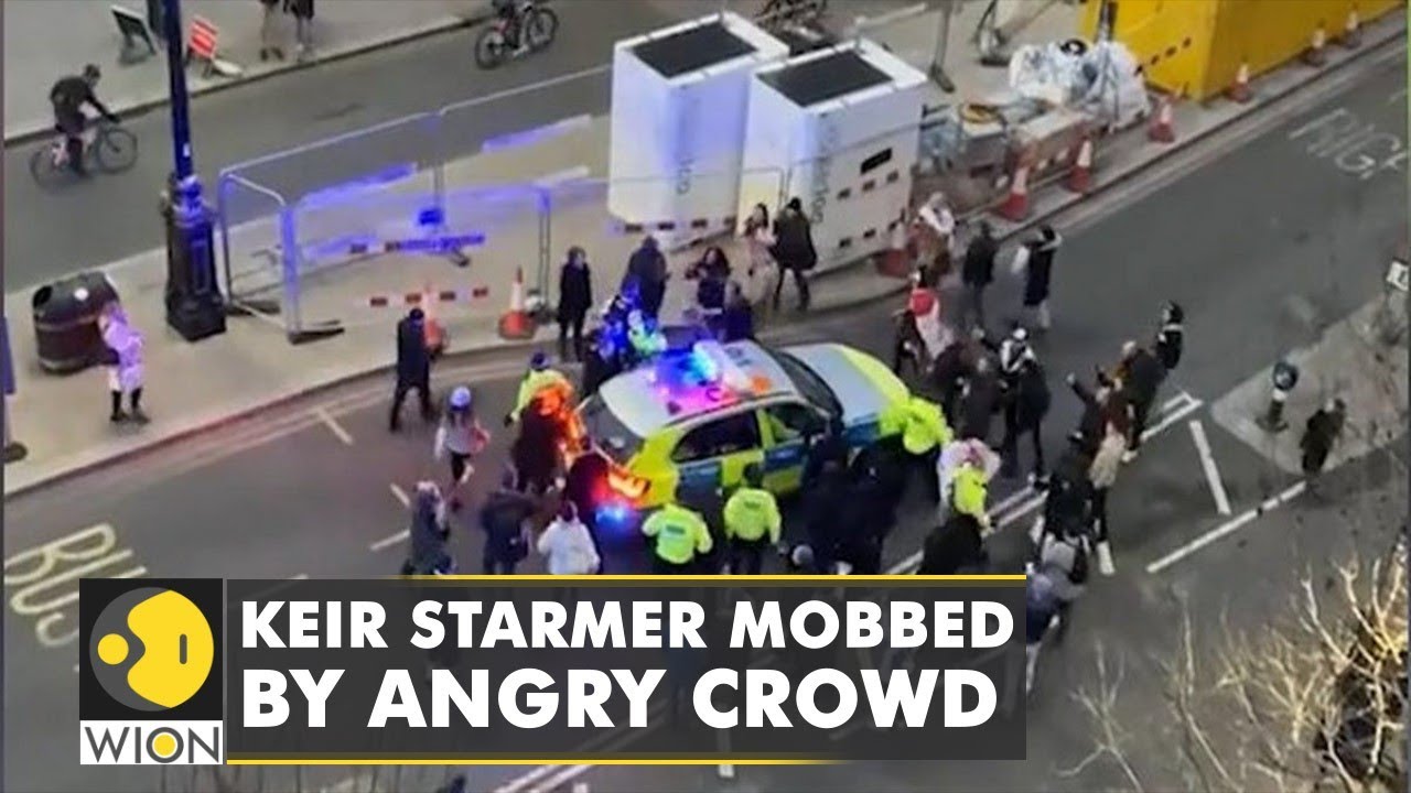 Labour leader Keir Starmer heckled by angry mob outside Parliament ...