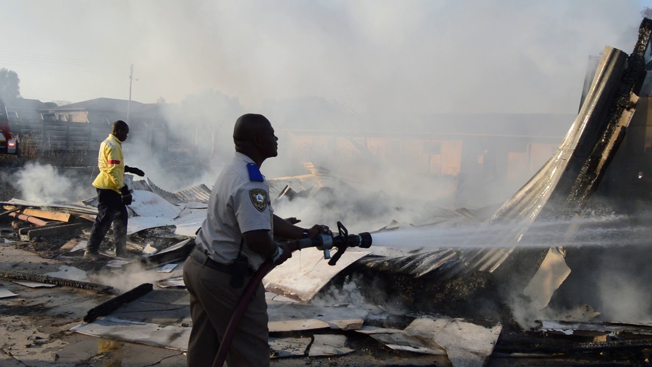 Building destroyed by fire - YouTube