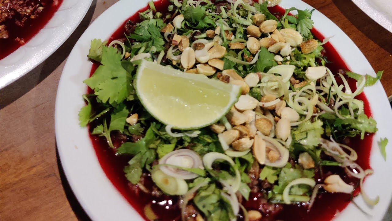 Trying raw Duck Blood salad for the first time | larb | Lao dish - YouTube