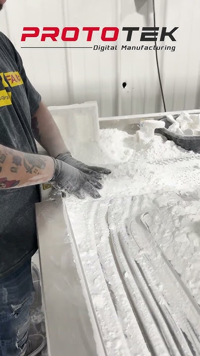 Digging through Nylon 12 after SLS 3D Printing Parts at Prototek - YouTube