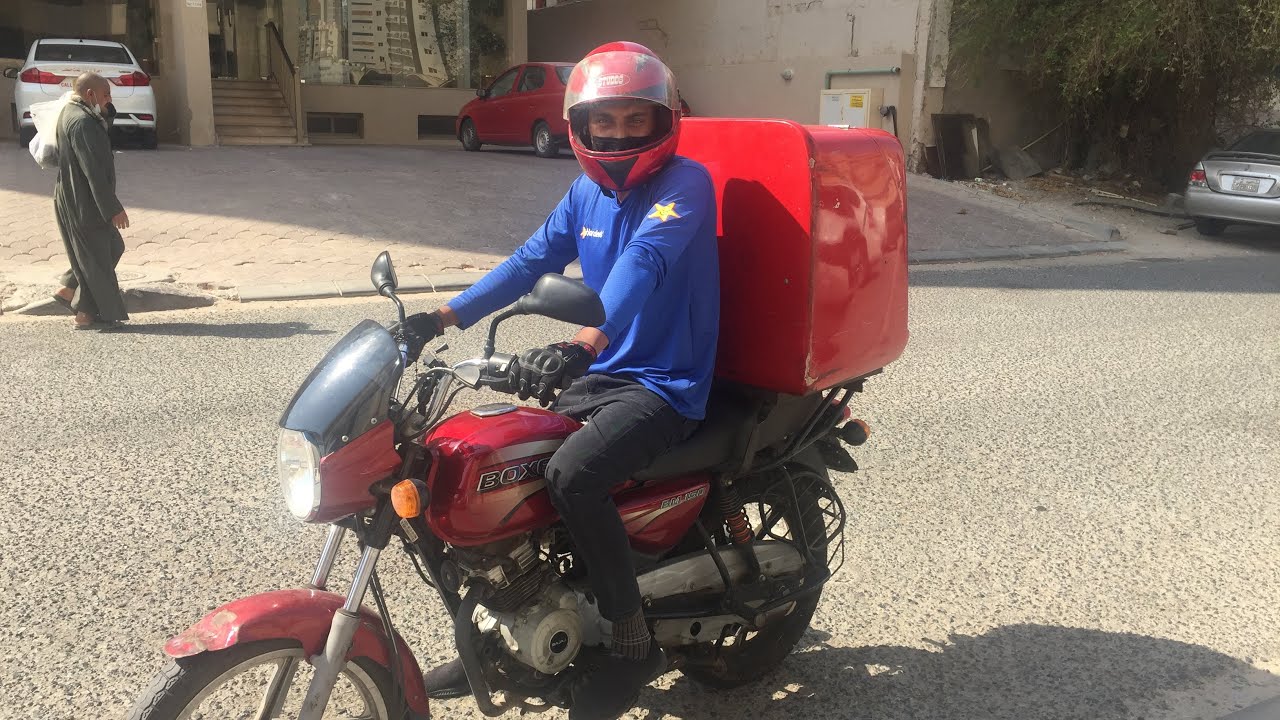 Motorbike delivery food in Kuwait - YouTube