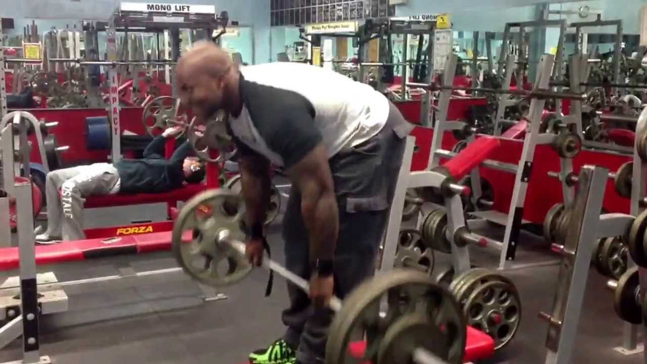 Arnold bend over rolls 245lb - YouTube