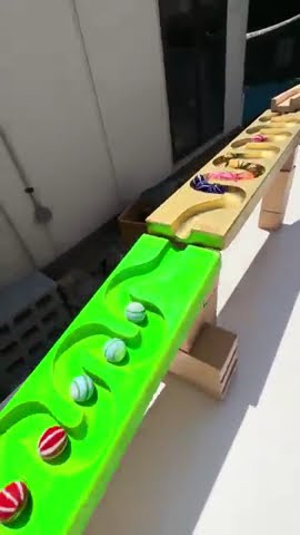 Enjoy the handmade wooden marble run course. Ilike the sound and ...