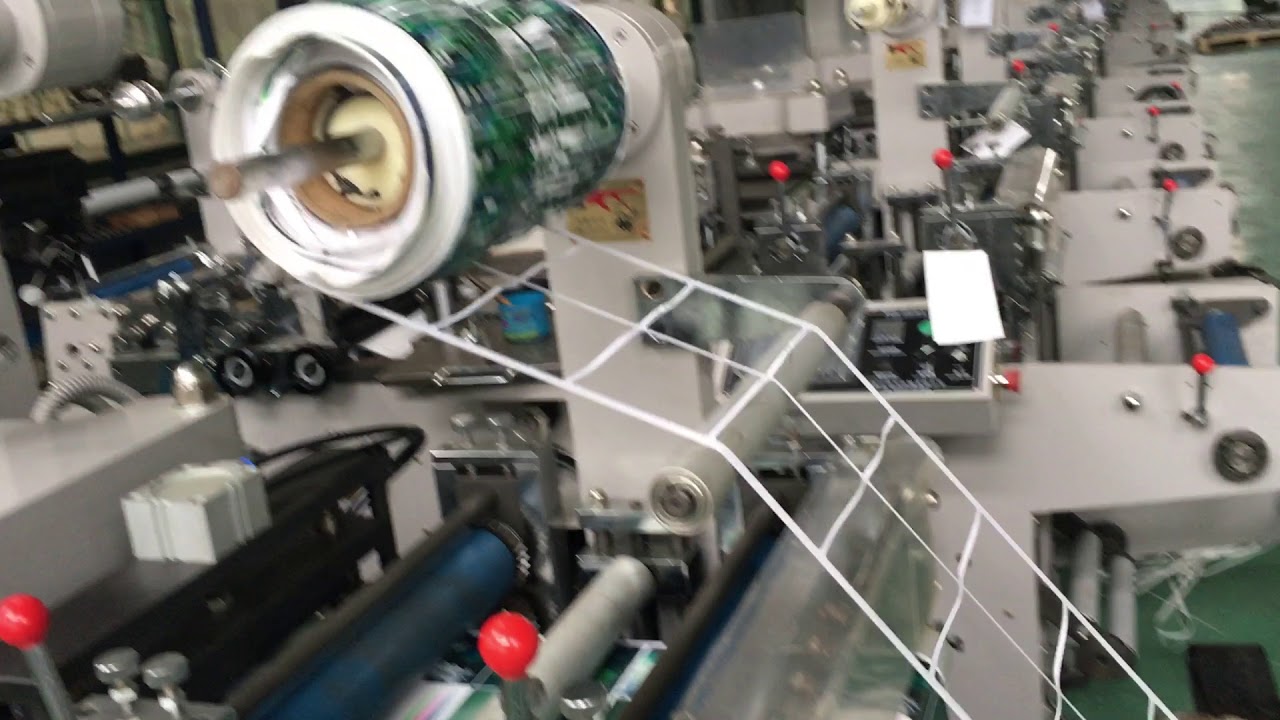 WQM-320G label die cutting machine with inline slitter - YouTube