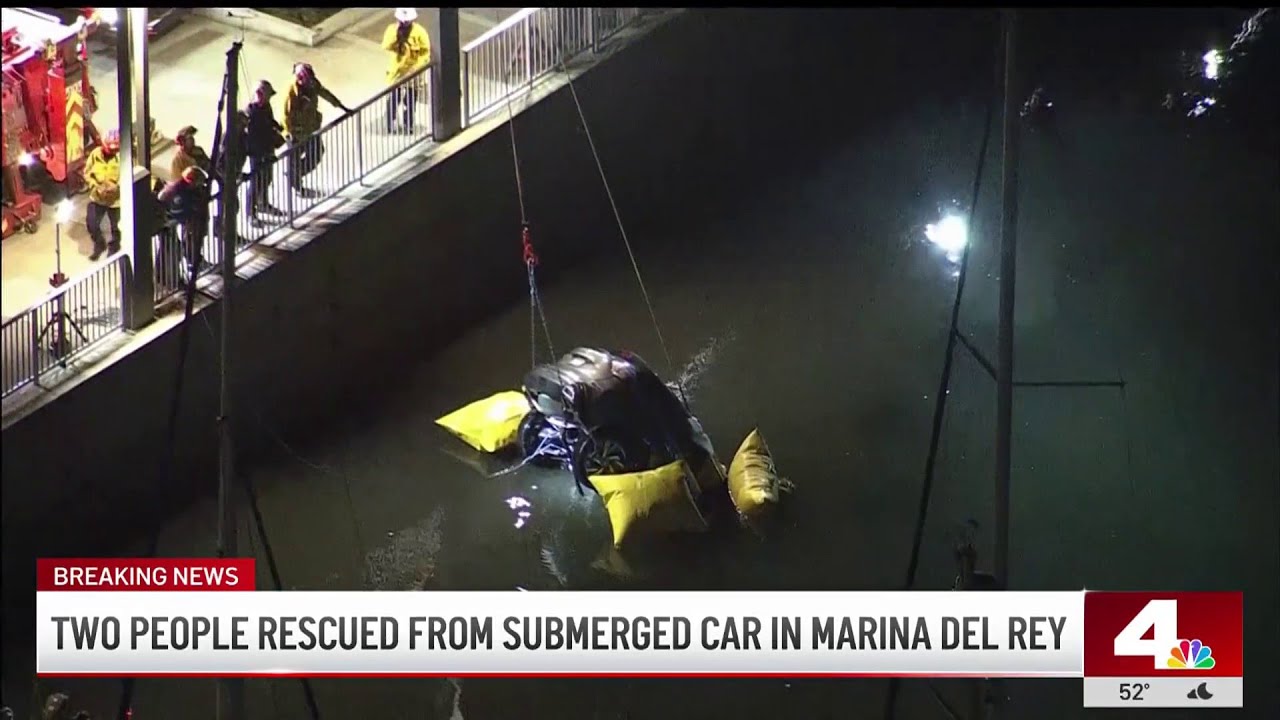 Two people rescued from submerged car in Marina del Rey - YouTube