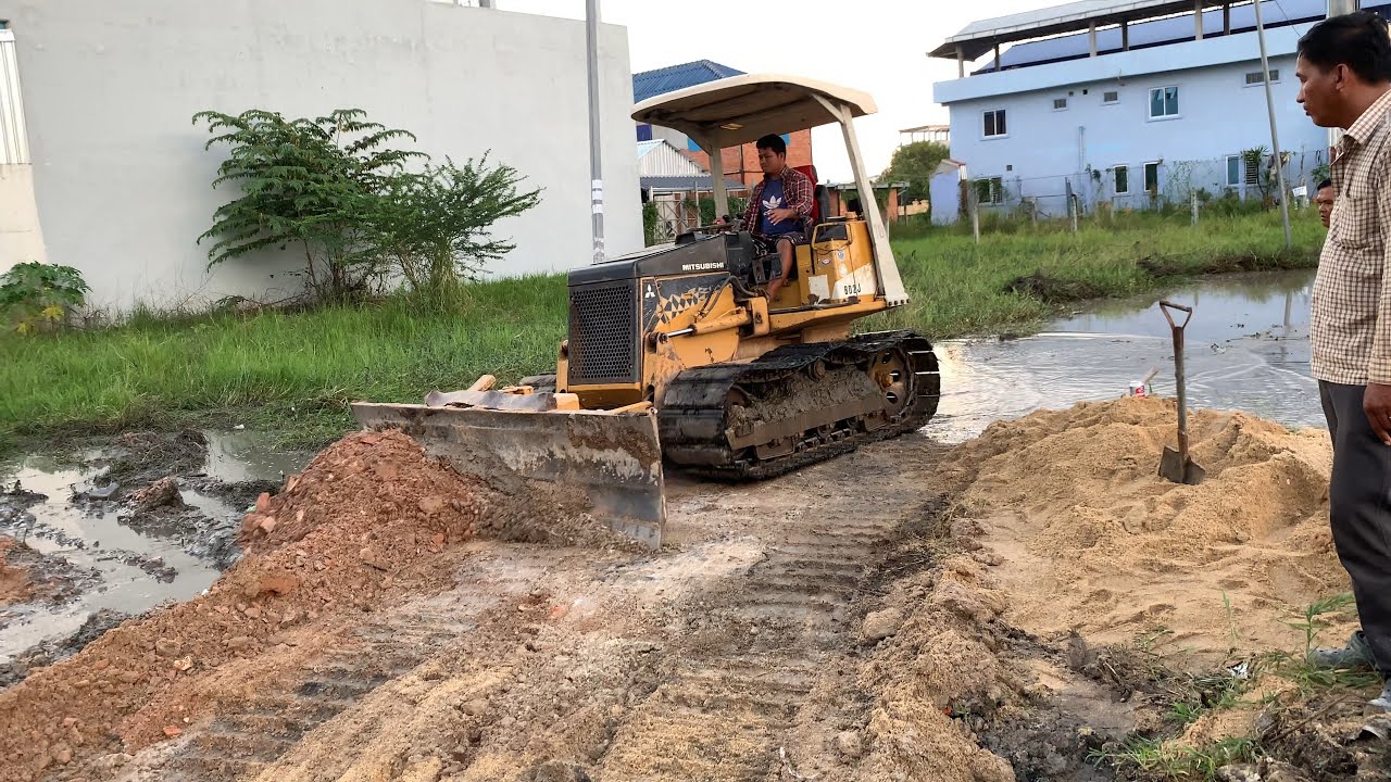 bulldozer push widen the road - YouTube